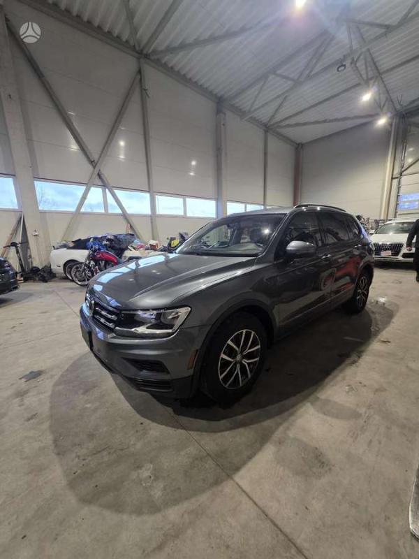 Grey Volkswagen Tiguan 2021 in Klaipeda, with an engine capacity of 1.98 L and mileage of 209 thousand km for 13000 €, photo 6 on AUTOMOTO.COM.LV