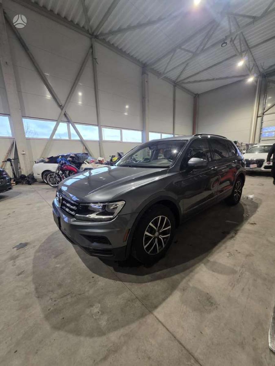 Grey Volkswagen Tiguan 2021 in Klaipeda, with an engine capacity of 1.98 L and mileage of 209 thousand km for 13000 €, photo 6 on AUTOMOTO.COM.LV