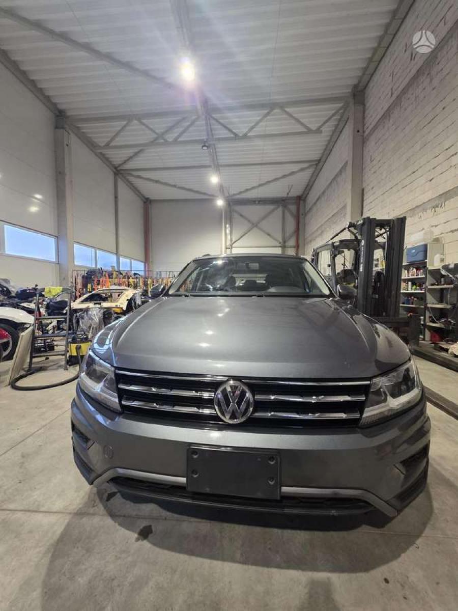 Grey Volkswagen Tiguan 2021 in Klaipeda, with an engine capacity of 1.98 L and mileage of 209 thousand km for 13000 €, photo 7 on AUTOMOTO.COM.LV