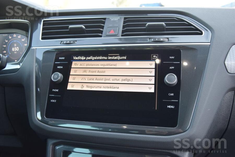 Grey Volkswagen Tiguan 2021 in Riga, with an engine capacity of 1.50 L and mileage of 54 thousand km for 22000 €, photo 9 on AUTOMOTO.COM.LV