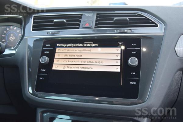 Grey Volkswagen Tiguan 2021 in Riga, with an engine capacity of 1.50 L and mileage of 54 thousand km for 22000 €, photo 9 on AUTOMOTO.COM.LV