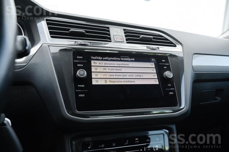 Grey Volkswagen Tiguan 2021 in Riga, with an engine capacity of 1.50 L and mileage of 84 thousand km for 19350 €, photo 23 on AUTOMOTO.COM.LV