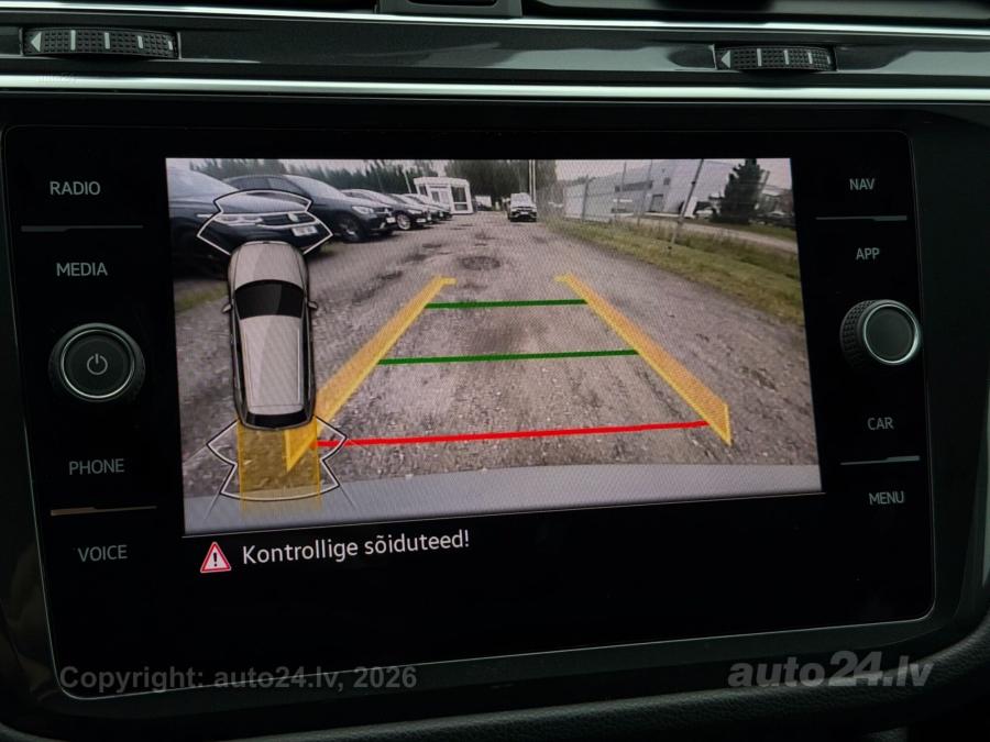 Grey Volkswagen Tiguan 2021 in Parnu, with an engine capacity of 2.00 L and mileage of 107 thousand km for 26900 €, photo 12 on AUTOMOTO.COM.LV