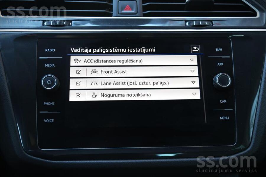 Grey Volkswagen Tiguan 2022 in Riga, with an engine capacity of 2.00 L and mileage of 221 thousand km for 17995 €, photo 21 on AUTOMOTO.COM.LV