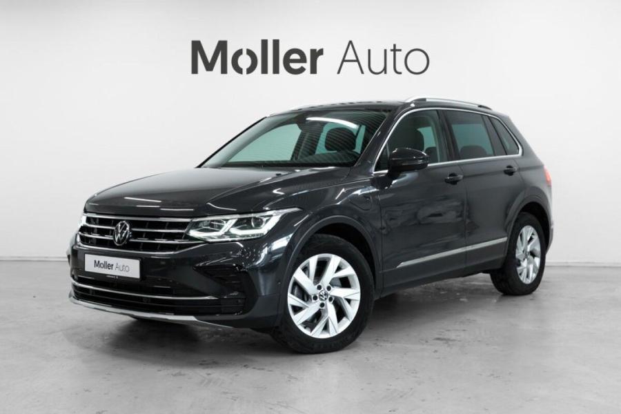 Grey Volkswagen Tiguan 2022 in Vilnius, with an engine capacity of 1.40 L and mileage of 131 thousand km for 23900 €, photo 1 on AUTOMOTO.COM.LV