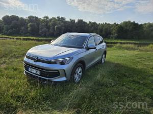 Grey Volkswagen Tiguan 2024 in Riga, with an engine capacity of 2.00 L and mileage of 70 thousand km for 32000 €, photo  on AUTOMOTO.COM.LV