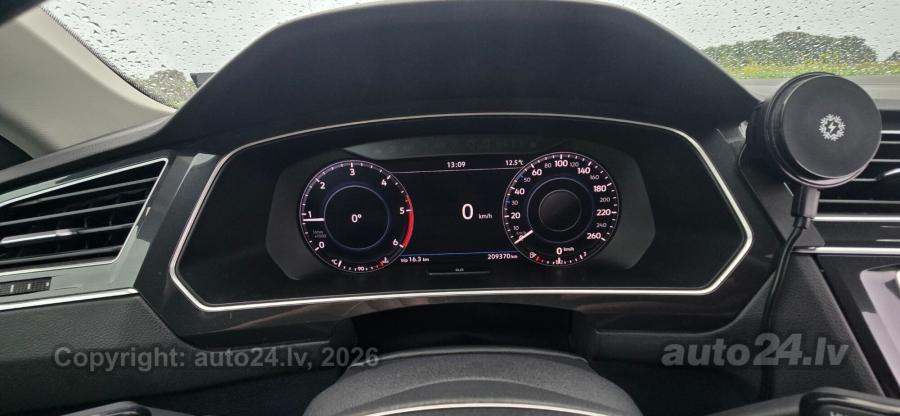 Grey Volkswagen Tiguan 2016 in Johvi, with an engine capacity of 2.00 L and mileage of 210 thousand km for 14500 €, photo 16 on AUTOMOTO.COM.LV