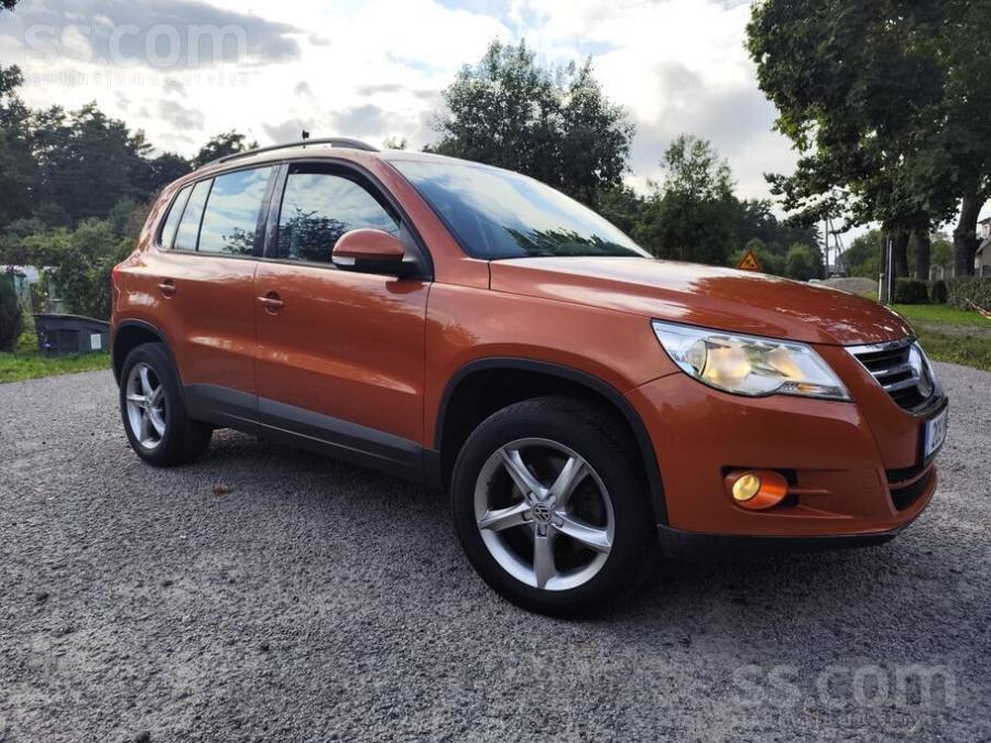 Orange Volkswagen Tiguan 2010 in Riga, with an engine capacity of 1.40 L and mileage of 251 thousand km for 4800 €, photo 3 on AUTOMOTO.COM.LV