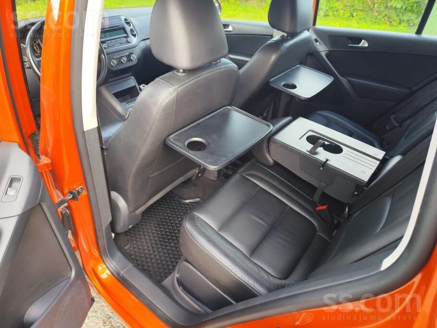 Orange Volkswagen Tiguan 2010 in Riga, with an engine capacity of 1.40 L and mileage of 251 thousand km for 4800 €, photo 11 on AUTOMOTO.COM.LV