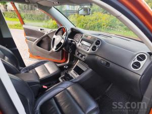 Orange Volkswagen Tiguan 2010 in Riga, with an engine capacity of 1.40 L and mileage of 251 thousand km for 4800 €, photo 15 on AUTOMOTO.COM.LV