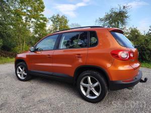 Orange Volkswagen Tiguan 2010 in Riga, with an engine capacity of 1.40 L and mileage of 251 thousand km for 4800 €, photo 7 on AUTOMOTO.COM.LV