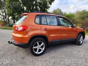 Orange Volkswagen Tiguan 2010 in Riga, with an engine capacity of 1.40 L and mileage of 251 thousand km for 4800 €, photo 4 on AUTOMOTO.COM.LV