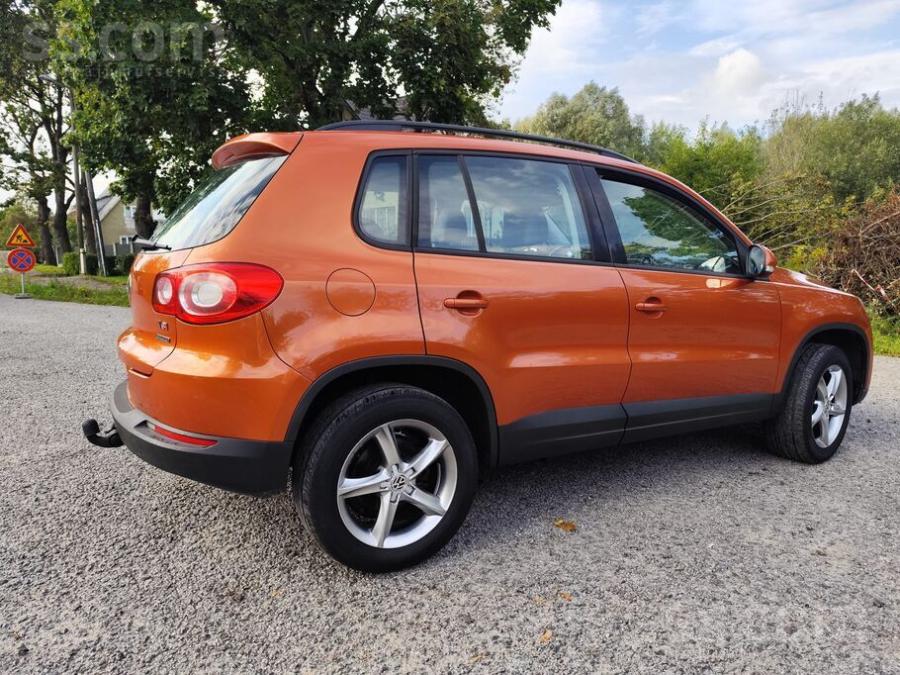 Orange Volkswagen Tiguan 2010 in Riga, with an engine capacity of 1.40 L and mileage of 251 thousand km for 4800 €, photo 4 on AUTOMOTO.COM.LV