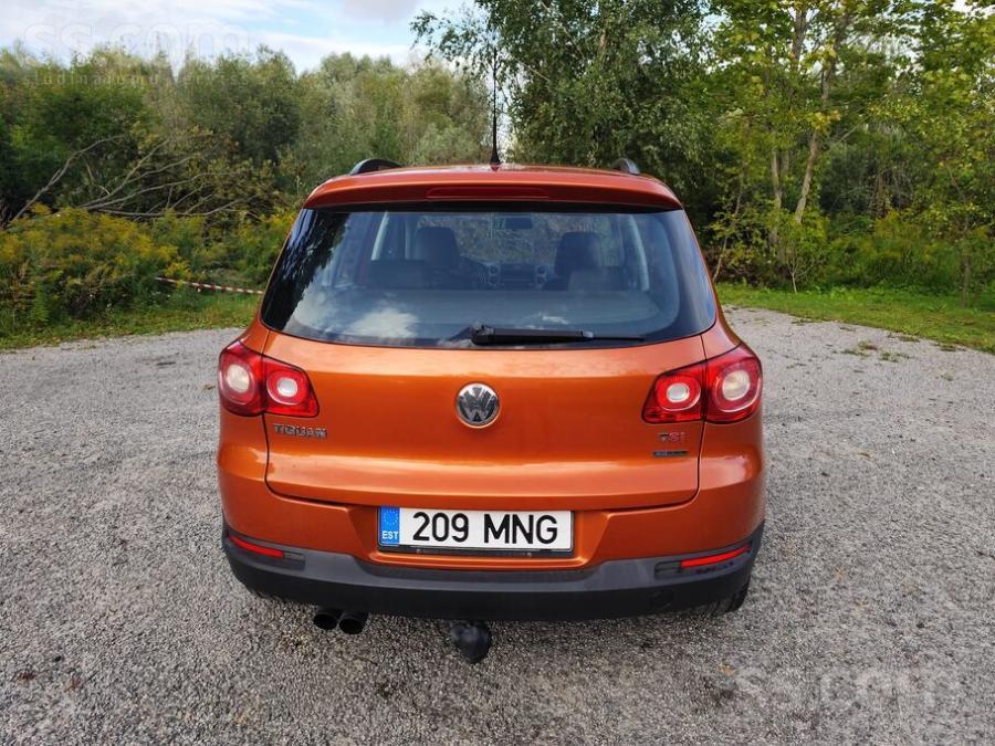Orange Volkswagen Tiguan 2010 in Riga, with an engine capacity of 1.40 L and mileage of 251 thousand km for 4800 €, photo 5 on AUTOMOTO.COM.LV