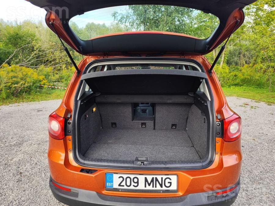Orange Volkswagen Tiguan 2010 in Riga, with an engine capacity of 1.40 L and mileage of 251 thousand km for 4800 €, photo 6 on AUTOMOTO.COM.LV