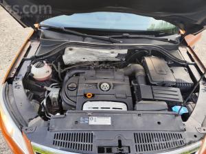 Orange Volkswagen Tiguan 2010 in Riga, with an engine capacity of 1.40 L and mileage of 251 thousand km for 4800 €, photo 9 on AUTOMOTO.COM.LV