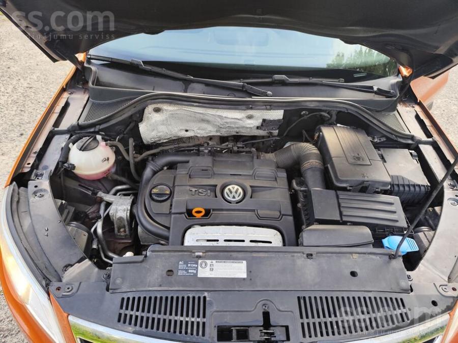 Orange Volkswagen Tiguan 2010 in Riga, with an engine capacity of 1.40 L and mileage of 251 thousand km for 4800 €, photo 9 on AUTOMOTO.COM.LV