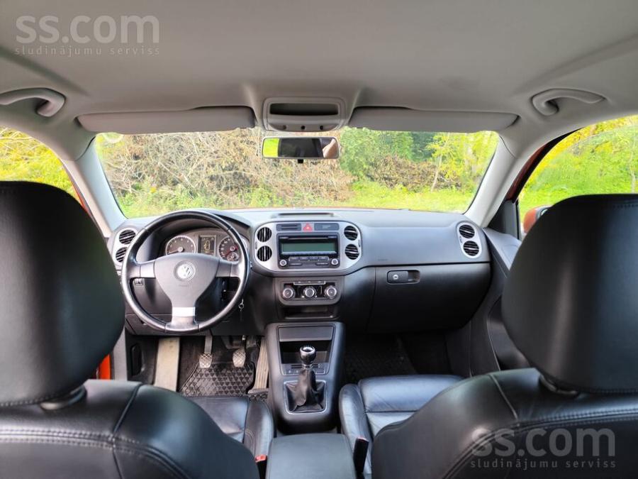 Orange Volkswagen Tiguan 2010 in Riga, with an engine capacity of 1.40 L and mileage of 251 thousand km for 4800 €, photo 10 on AUTOMOTO.COM.LV