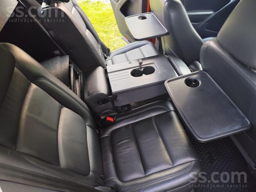 Orange Volkswagen Tiguan 2010 in Riga, with an engine capacity of 1.40 L and mileage of 251 thousand km for 4800 €, photo 13 on AUTOMOTO.COM.LV