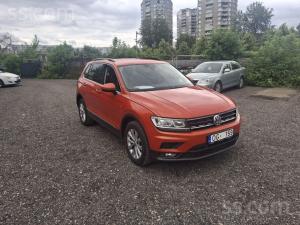 Orange Volkswagen Tiguan 2017 in Riga, with an engine capacity of 1.40 L and mileage of 146 thousand km for 18990 €, photo 2 on AUTOMOTO.COM.LV