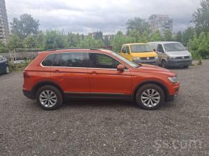 Orange Volkswagen Tiguan 2017 in Riga, with an engine capacity of 1.40 L and mileage of 146 thousand km for 18990 €, photo 5 on AUTOMOTO.COM.LV