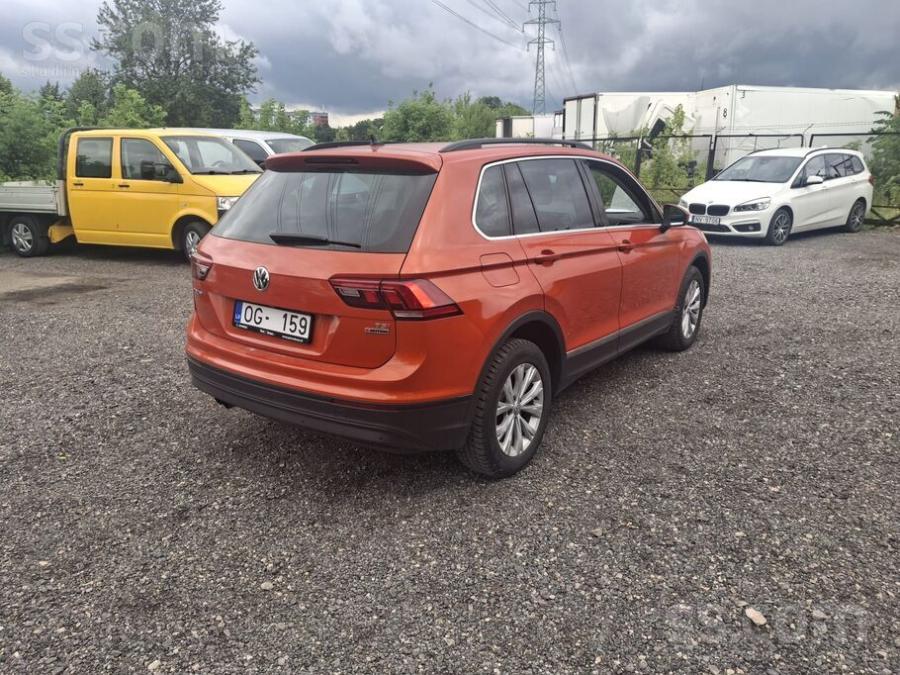 Orange Volkswagen Tiguan 2017 in Riga, with an engine capacity of 1.40 L and mileage of 146 thousand km for 18990 €, photo 6 on AUTOMOTO.COM.LV