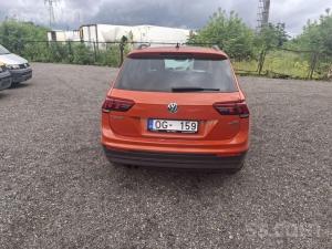 Orange Volkswagen Tiguan 2017 in Riga, with an engine capacity of 1.40 L and mileage of 146 thousand km for 18990 €, photo 7 on AUTOMOTO.COM.LV