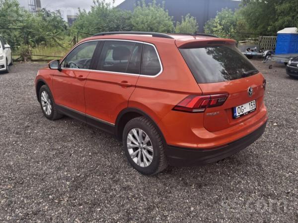 Orange Volkswagen Tiguan 2017 in Riga, with an engine capacity of 1.40 L and mileage of 146 thousand km for 18990 €, photo 8 on AUTOMOTO.COM.LV