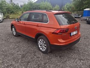 Orange Volkswagen Tiguan 2017 in Riga, with an engine capacity of 1.40 L and mileage of 146 thousand km for 18990 €, photo 8 on AUTOMOTO.COM.LV