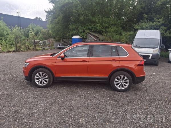Orange Volkswagen Tiguan 2017 in Riga, with an engine capacity of 1.40 L and mileage of 146 thousand km for 18990 €, photo 9 on AUTOMOTO.COM.LV