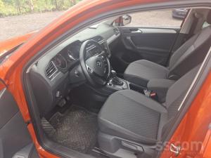 Orange Volkswagen Tiguan 2017 in Riga, with an engine capacity of 1.40 L and mileage of 146 thousand km for 18990 €, photo 13 on AUTOMOTO.COM.LV