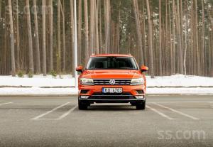 Orange Volkswagen Tiguan 2017 in Riga, with an engine capacity of 2.00 L and mileage of 191 thousand km for 16490 €, photo 4 on AUTOMOTO.COM.LV