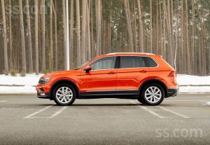 Orange Volkswagen Tiguan 2017 in Riga, with an engine capacity of 2.00 L and mileage of 191 thousand km for 16490 €, photo 5 on AUTOMOTO.COM.LV