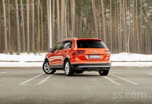 Orange Volkswagen Tiguan 2017 in Riga, with an engine capacity of 2.00 L and mileage of 191 thousand km for 16490 €, photo 8 on AUTOMOTO.COM.LV