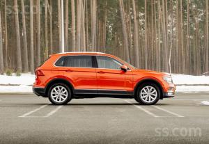 Orange Volkswagen Tiguan 2017 in Riga, with an engine capacity of 2.00 L and mileage of 191 thousand km for 16490 €, photo 9 on AUTOMOTO.COM.LV