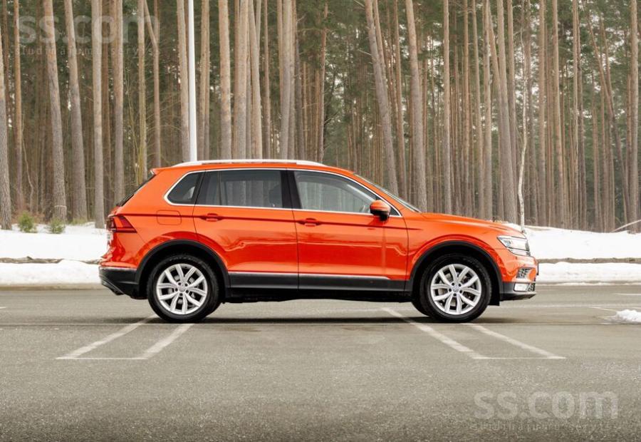 Orange Volkswagen Tiguan 2017 in Riga, with an engine capacity of 2.00 L and mileage of 191 thousand km for 16490 €, photo 9 on AUTOMOTO.COM.LV