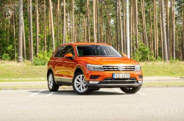 Orange Volkswagen Tiguan 2017 in Riga, with an engine capacity of 2.00 L and mileage of 191 thousand km for 16490 €, photo 2 on AUTOMOTO.COM.LV