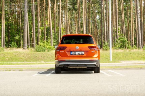 Orange Volkswagen Tiguan 2017 in Riga, with an engine capacity of 2.00 L and mileage of 191 thousand km for 16490 €, photo 7 on AUTOMOTO.COM.LV