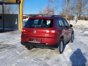Red Volkswagen Tiguan 2008 in Radviliskis, with an engine capacity of 2.00 L and mileage of 283 thousand km for 4600 €, photo 8 on AUTOMOTO.COM.LV