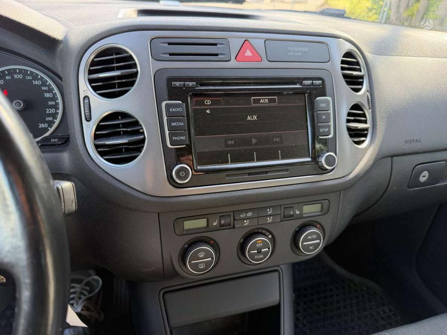 Red Volkswagen Tiguan 2008 in Marijampole, with an engine capacity of 1.97 L and mileage of 302 thousand km for 1950 €, photo 10 on AUTOMOTO.COM.LV