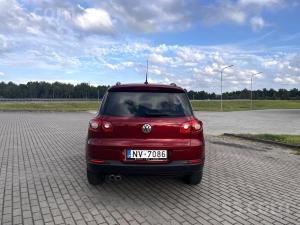 Red Volkswagen Tiguan 2009 in Talsi, with an engine capacity of 2.00 L and mileage of 244 thousand km for 6200 €, photo 7 on AUTOMOTO.COM.LV