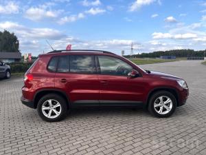 Red Volkswagen Tiguan 2009 in Talsi, with an engine capacity of 2.00 L and mileage of 244 thousand km for 6200 €, photo 9 on AUTOMOTO.COM.LV