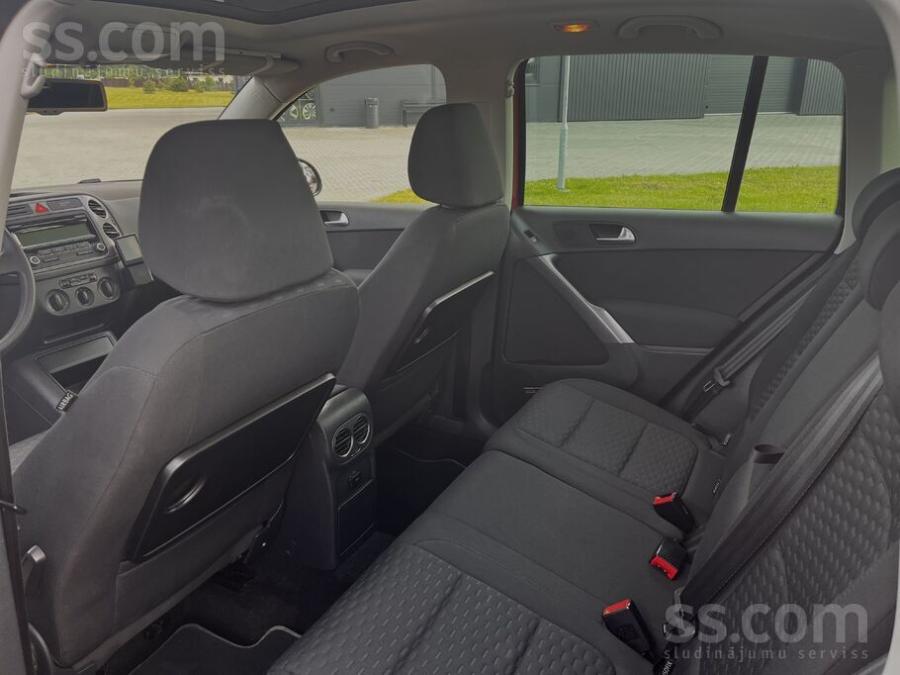 Red Volkswagen Tiguan 2009 in Talsi, with an engine capacity of 2.00 L and mileage of 244 thousand km for 6200 €, photo 13 on AUTOMOTO.COM.LV