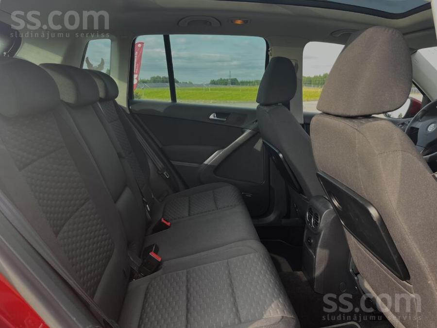 Red Volkswagen Tiguan 2009 in Talsi, with an engine capacity of 2.00 L and mileage of 244 thousand km for 6200 €, photo 14 on AUTOMOTO.COM.LV