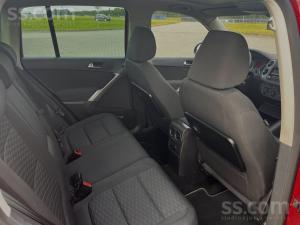 Red Volkswagen Tiguan 2009 in Talsi, with an engine capacity of 2.00 L and mileage of 244 thousand km for 6200 €, photo 15 on AUTOMOTO.COM.LV