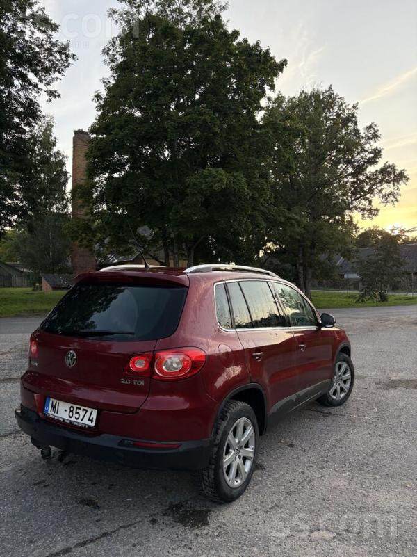 Sarkans Volkswagen Tiguan 2009 Limbaži, ar dzinēja tilpumu 2.00 L un nobraukumu 348 tūkst. km par 5500 €, foto 3 vietnē AUTOMOTO.COM.LV
