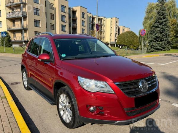 Sarkans Volkswagen Tiguan 2011 Rīga, ar dzinēja tilpumu 1.40 L un nobraukumu 193 tūkst. km par 6350 €, foto 4 vietnē AUTOMOTO.COM.LV