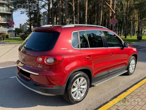 Sarkans Volkswagen Tiguan 2011 Rīga, ar dzinēja tilpumu 1.40 L un nobraukumu 193 tūkst. km par 6350 €, foto 5 vietnē AUTOMOTO.COM.LV