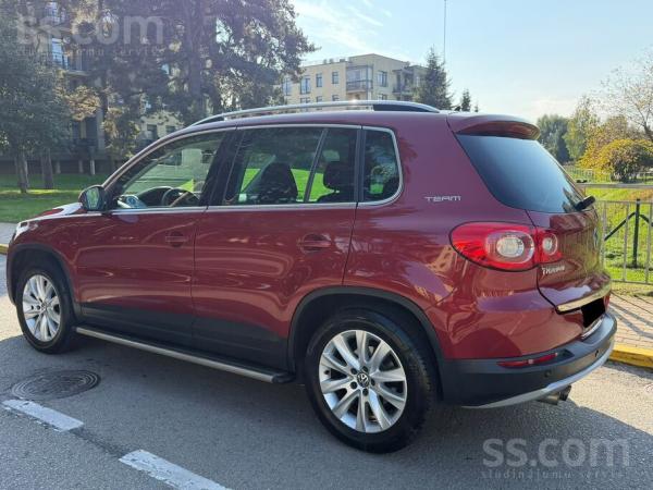 Sarkans Volkswagen Tiguan 2011 Rīga, ar dzinēja tilpumu 1.40 L un nobraukumu 193 tūkst. km par 6350 €, foto 7 vietnē AUTOMOTO.COM.LV