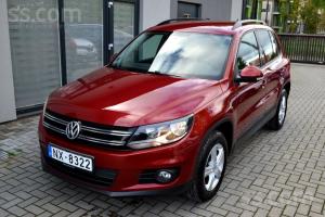 Red Volkswagen Tiguan 2012 in Riga, with an engine capacity of 1.40 L and mileage of 255 thousand km for 6990 €, photo  on AUTOMOTO.COM.LV